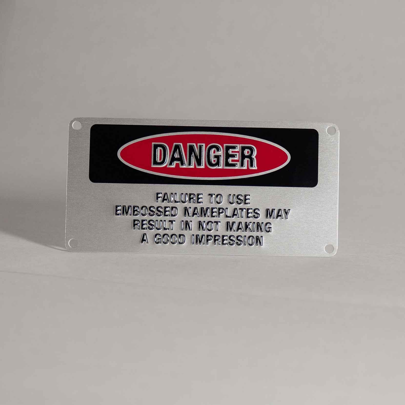 ADA-Compliant Braille Signs & Embossed Tags | Yeuell Nameplate & Label